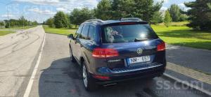 Zils Volkswagen Touareg 2011 Rīga, ar dzinēja tilpumu 3.00 L un nobraukumu 259 tūkst. km par 10500 €, foto 5 vietnē AUTOMOTO.COM.LV
