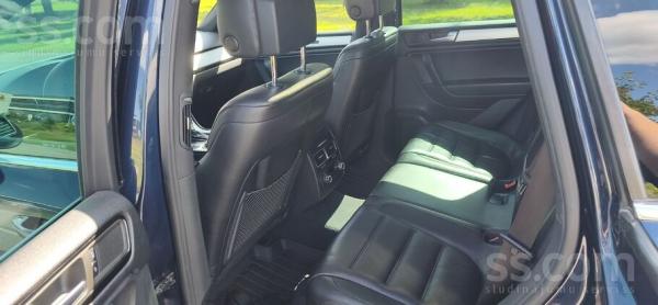 Blue Volkswagen Touareg 2011 in Riga, with an engine capacity of 3.00 L and mileage of 259 thousand km for 10500 €, photo 9 on AUTOMOTO.COM.LV