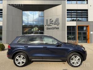Zils Volkswagen Touareg 2011 Rīga, ar dzinēja tilpumu 3.00 L un nobraukumu 299 tūkst. km par 10999 €, foto 5 vietnē AUTOMOTO.COM.LV