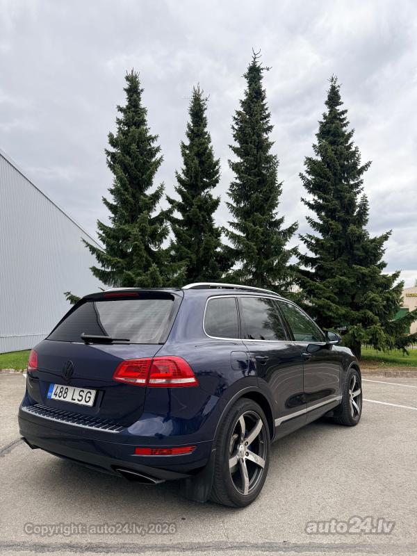 Blue Volkswagen Touareg 2012 in Tallinn, with an engine capacity of 3.00 L and mileage of 251 thousand km for 14000 €, photo 7 on AUTOMOTO.COM.LV