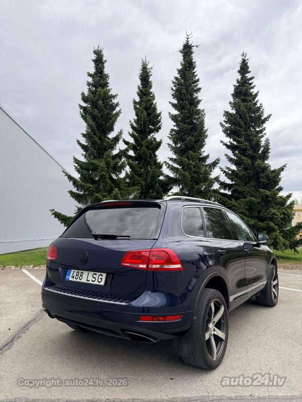 Blue Volkswagen Touareg 2012 in Tallinn, with an engine capacity of 3.00 L and mileage of 251 thousand km for 14000 €, photo 8 on AUTOMOTO.COM.LV