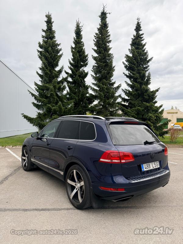 Blue Volkswagen Touareg 2012 in Tallinn, with an engine capacity of 3.00 L and mileage of 251 thousand km for 14000 €, photo 10 on AUTOMOTO.COM.LV