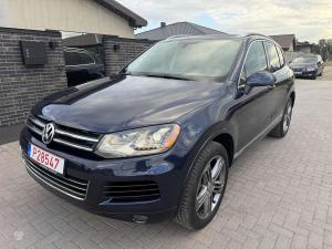Blue Volkswagen Touareg 2012 in Siauliai, with an engine capacity of 3.60 L and mileage of 245 thousand km for 8500 €, photo 3 on AUTOMOTO.COM.LV