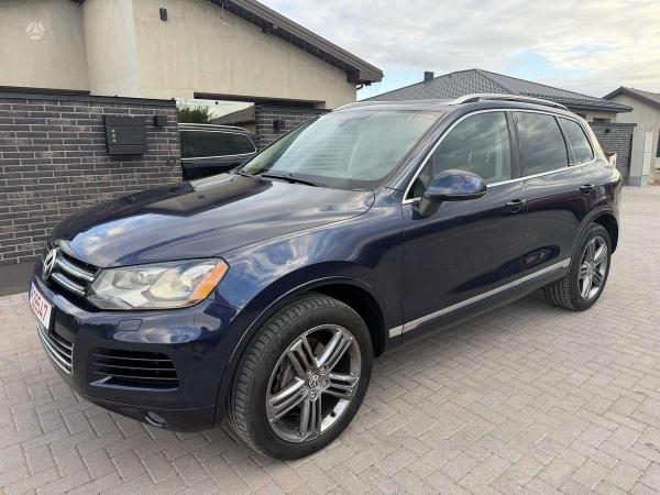 Blue Volkswagen Touareg 2012 in Siauliai, with an engine capacity of 3.60 L and mileage of 245 thousand km for 8500 €, photo 4 on AUTOMOTO.COM.LV