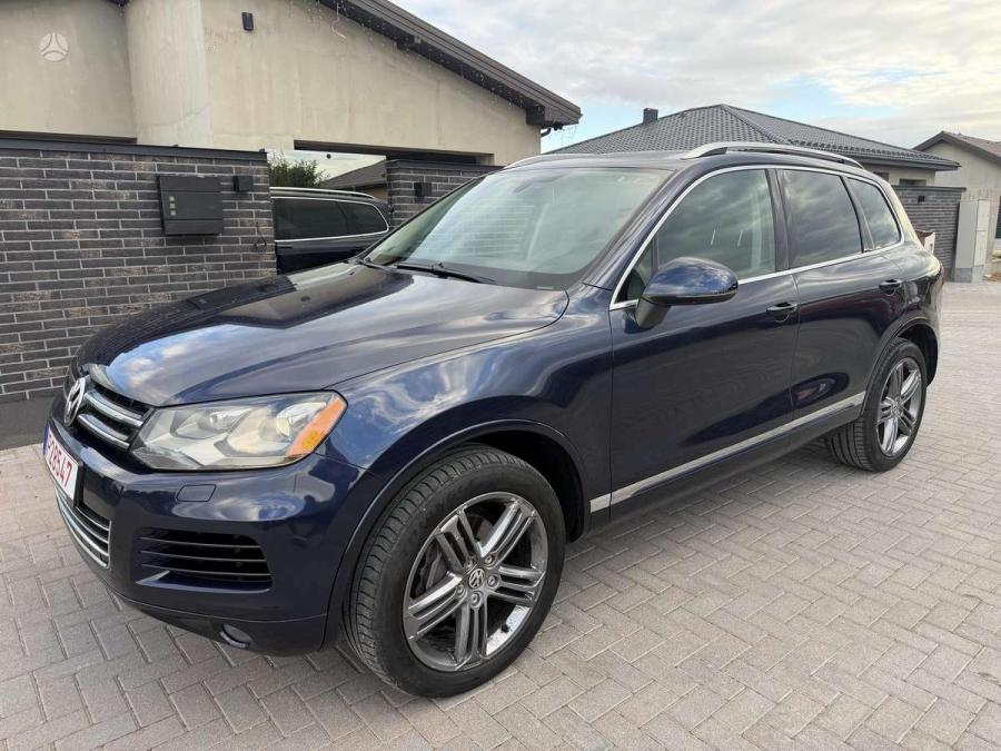 Blue Volkswagen Touareg 2012 in Siauliai, with an engine capacity of 3.60 L and mileage of 245 thousand km for 8500 €, photo 4 on AUTOMOTO.COM.LV