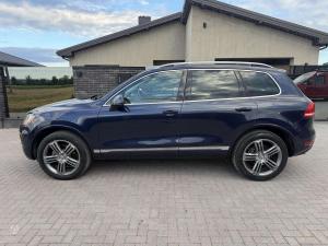 Blue Volkswagen Touareg 2012 in Siauliai, with an engine capacity of 3.60 L and mileage of 245 thousand km for 8500 €, photo 5 on AUTOMOTO.COM.LV