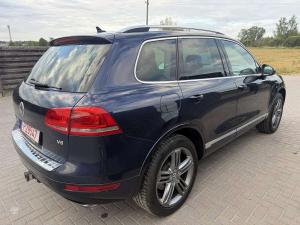 Blue Volkswagen Touareg 2012 in Siauliai, with an engine capacity of 3.60 L and mileage of 245 thousand km for 8500 €, photo 8 on AUTOMOTO.COM.LV
