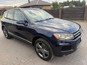 Blue Volkswagen Touareg 2012 in Siauliai, with an engine capacity of 3.60 L and mileage of 245 thousand km for 8500 €, photo 9 on AUTOMOTO.COM.LV