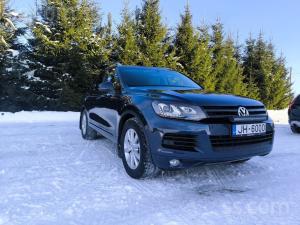 Blue Volkswagen Touareg 2013 in Rezekne, with an engine capacity of 3.00 L and mileage of 252 thousand km for 12700 €, photo 4 on AUTOMOTO.COM.LV