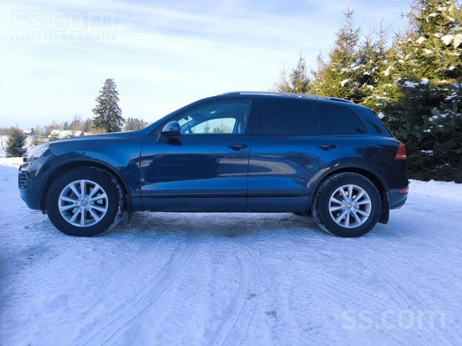 Blue Volkswagen Touareg 2013 in Rezekne, with an engine capacity of 3.00 L and mileage of 252 thousand km for 12700 €, photo 8 on AUTOMOTO.COM.LV