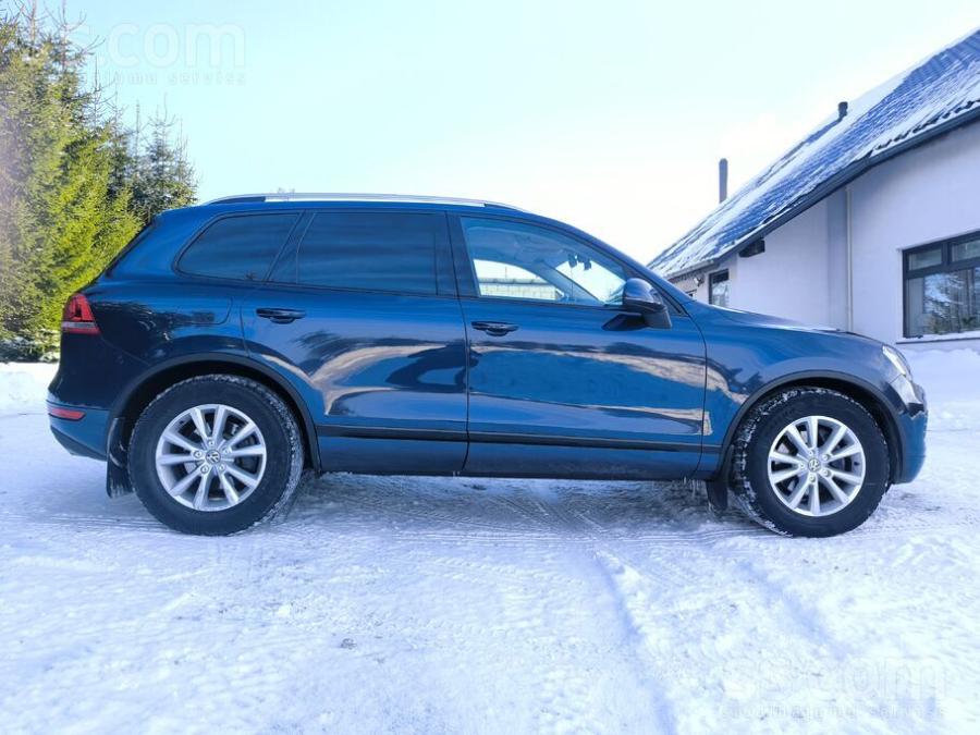 Blue Volkswagen Touareg 2013 in Rezekne, with an engine capacity of 3.00 L and mileage of 252 thousand km for 12700 €, photo 9 on AUTOMOTO.COM.LV