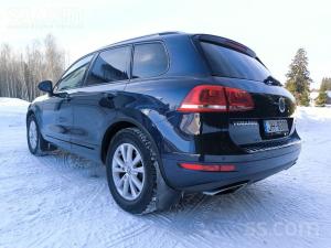 Blue Volkswagen Touareg 2013 in Rezekne, with an engine capacity of 3.00 L and mileage of 252 thousand km for 12700 €, photo 11 on AUTOMOTO.COM.LV