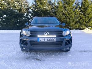 Blue Volkswagen Touareg 2013 in Rezekne, with an engine capacity of 3.00 L and mileage of 252 thousand km for 12700 €, photo 15 on AUTOMOTO.COM.LV