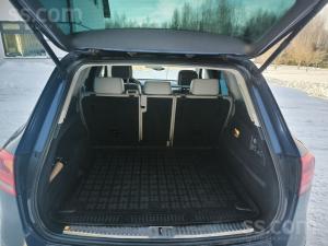 Blue Volkswagen Touareg 2013 in Rezekne, with an engine capacity of 3.00 L and mileage of 252 thousand km for 12700 €, photo 16 on AUTOMOTO.COM.LV