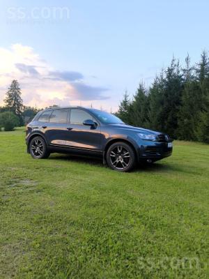 Blue Volkswagen Touareg 2013 in Rezekne, with an engine capacity of 3.00 L and mileage of 252 thousand km for 12700 €, photo 28 on AUTOMOTO.COM.LV