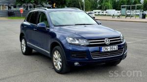 Blue Volkswagen Touareg 2013 in Riga, with an engine capacity of 3.00 L and mileage of 269 thousand km for 10900 €, photo 7 on AUTOMOTO.COM.LV