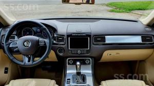 Blue Volkswagen Touareg 2013 in Riga, with an engine capacity of 3.00 L and mileage of 269 thousand km for 10900 €, photo 9 on AUTOMOTO.COM.LV