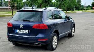 Blue Volkswagen Touareg 2013 in Riga, with an engine capacity of 3.00 L and mileage of 269 thousand km for 10900 €, photo 6 on AUTOMOTO.COM.LV