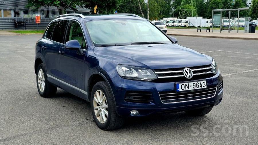 Blue Volkswagen Touareg 2013 in Riga, with an engine capacity of 3.00 L and mileage of 269 thousand km for 10900 €, photo 8 on AUTOMOTO.COM.LV