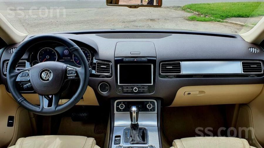 Blue Volkswagen Touareg 2013 in Riga, with an engine capacity of 3.00 L and mileage of 269 thousand km for 10900 €, photo 10 on AUTOMOTO.COM.LV