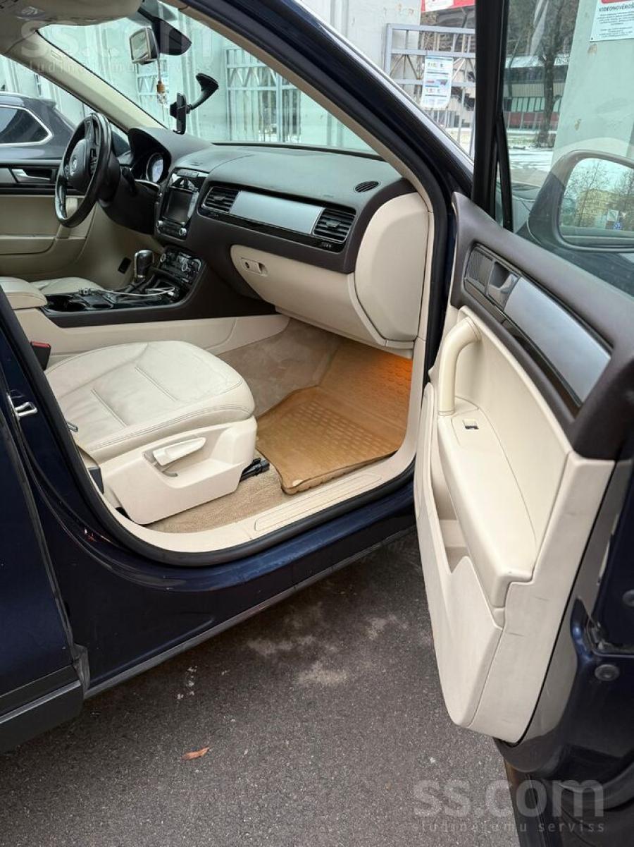 Blue Volkswagen Touareg 2013 in Talsi, with an engine capacity of 3.00 L and mileage of 412 thousand km for 7300 €, photo 9 on AUTOMOTO.COM.LV