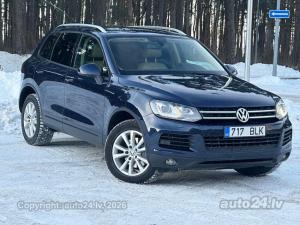 Blue Volkswagen Touareg 2014 in Tallinn, with an engine capacity of 3.00 L and mileage of 268 thousand km for 12490 €, photo 3 on AUTOMOTO.COM.LV
