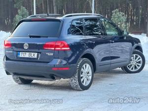 Blue Volkswagen Touareg 2014 in Tallinn, with an engine capacity of 3.00 L and mileage of 268 thousand km for 12490 €, photo 4 on AUTOMOTO.COM.LV