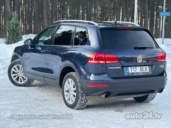 Zils Volkswagen Touareg 2014 Tallina, ar dzinēja tilpumu 3.00 L un nobraukumu 268 tūkst. km par 12490 €, foto 5 vietnē AUTOMOTO.COM.LV