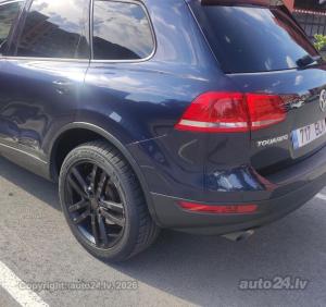 Blue Volkswagen Touareg 2014 in Tallinn, with an engine capacity of 3.00 L and mileage of 268 thousand km for 12490 €, photo 10 on AUTOMOTO.COM.LV