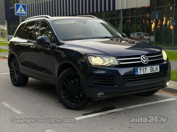 Zils Volkswagen Touareg 2014 Tallina, ar dzinēja tilpumu 3.00 L un nobraukumu 267 tūkst. km par 9900 €, foto 1 vietnē AUTOMOTO.COM.LV