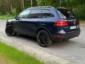 Zils Volkswagen Touareg 2014 Tallina, ar dzinēja tilpumu 3.00 L un nobraukumu 267 tūkst. km par 9900 €, foto 4 vietnē AUTOMOTO.COM.LV