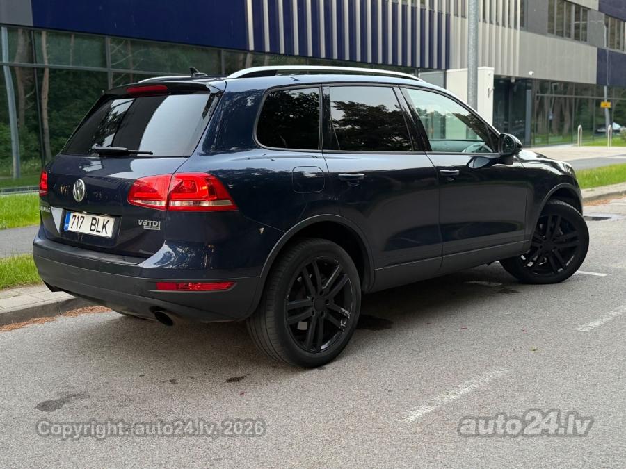 Zils Volkswagen Touareg 2014 Tallina, ar dzinēja tilpumu 3.00 L un nobraukumu 267 tūkst. km par 9900 €, foto 5 vietnē AUTOMOTO.COM.LV