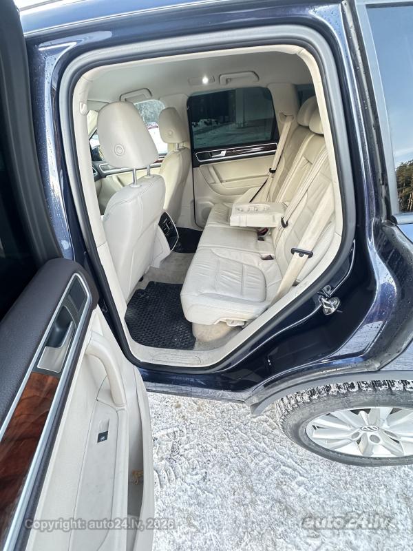 Zils Volkswagen Touareg 2014 Tallina, ar dzinēja tilpumu 3.00 L un nobraukumu 267 tūkst. km par 9900 €, foto 7 vietnē AUTOMOTO.COM.LV