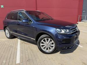 Blue Volkswagen Touareg 2014 in Kaunas, with an engine capacity of 2.97 L and mileage of 210 thousand km for 14500 €, photo  on AUTOMOTO.COM.LV
