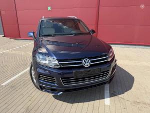 Blue Volkswagen Touareg 2014 in Kaunas, with an engine capacity of 2.97 L and mileage of 210 thousand km for 14500 €, photo 5 on AUTOMOTO.COM.LV