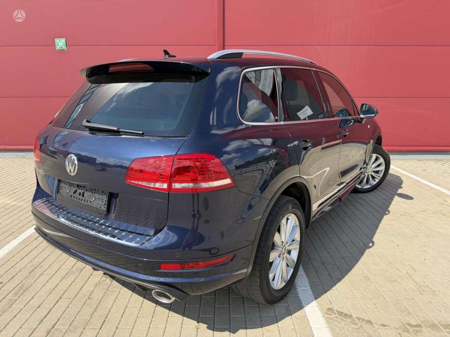 Blue Volkswagen Touareg 2014 in Kaunas, with an engine capacity of 2.97 L and mileage of 210 thousand km for 14500 €, photo 9 on AUTOMOTO.COM.LV