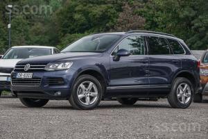 Blue Volkswagen Touareg 2014 in Riga, with an engine capacity of 3.00 L and mileage of 298 thousand km for 11990 €, photo  on AUTOMOTO.COM.LV