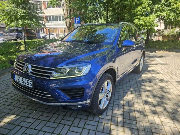 Zils Volkswagen Touareg 2015 Rīga, ar dzinēja tilpumu 3.00 L un nobraukumu 155 tūkst. km par 15600 €, foto 1 vietnē AUTOMOTO.COM.LV