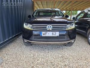 Blue Volkswagen Touareg 2015 in Riga, with an engine capacity of 3.00 L and mileage of 196 thousand km for 23500 €, photo  on AUTOMOTO.COM.LV