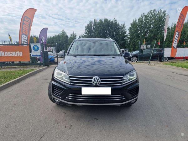 Blue Volkswagen Touareg 2015 in Kaunas, with an engine capacity of 2.97 L and mileage of 314 thousand km for 11400 €, photo 2 on AUTOMOTO.COM.LV