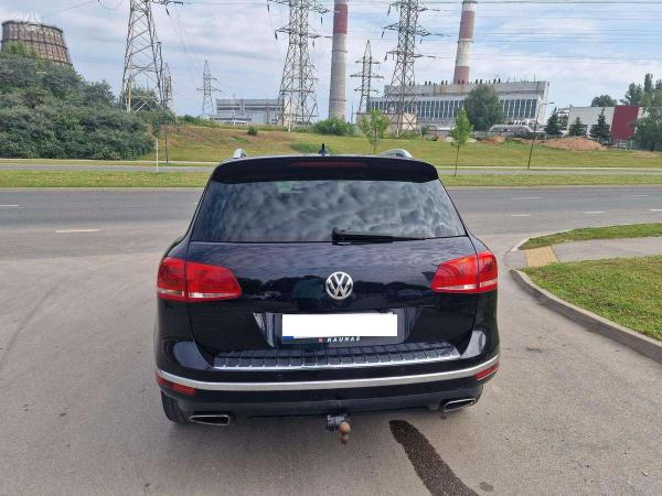 Blue Volkswagen Touareg 2015 in Kaunas, with an engine capacity of 2.97 L and mileage of 314 thousand km for 11400 €, photo 8 on AUTOMOTO.COM.LV