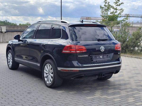 Blue Volkswagen Touareg 2017 in Siauliai, with an engine capacity of 3.60 L and mileage of 240 thousand km for 14000 €, photo 5 on AUTOMOTO.COM.LV