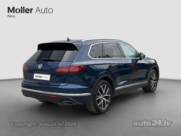 Blue Volkswagen Touareg 2018 in Parnu, with an engine capacity of 3.00 L and mileage of 117 thousand km for 37900 €, photo 2 on AUTOMOTO.COM.LV