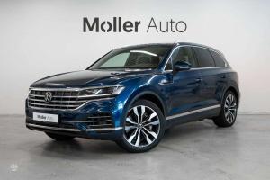 Blue Volkswagen Touareg 2021 in Vilnius, with an engine capacity of 3.00 L and mileage of 124 thousand km for 43500 €, photo  on AUTOMOTO.COM.LV