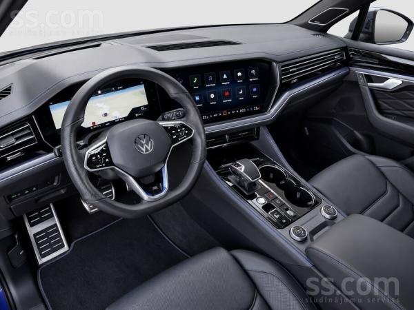 Blue Volkswagen Touareg 2024 in Riga, with an engine capacity of 3.00 L and mileage of 55 thousand km for 73890 €, photo 6 on AUTOMOTO.COM.LV