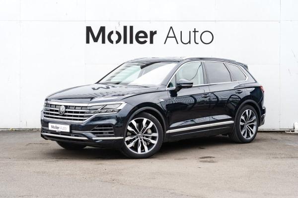 Blue Volkswagen Touareg 2021 in Riga, with an engine capacity of 3.00 L and mileage of 103 thousand km for 43900 €, photo 1 on AUTOMOTO.COM.LV