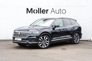Blue Volkswagen Touareg 2021 in Riga, with an engine capacity of 3.00 L and mileage of 103 thousand km for 43900 €, photo  on AUTOMOTO.COM.LV