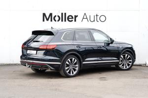 Blue Volkswagen Touareg 2021 in Riga, with an engine capacity of 3.00 L and mileage of 103 thousand km for 43900 €, photo 4 on AUTOMOTO.COM.LV