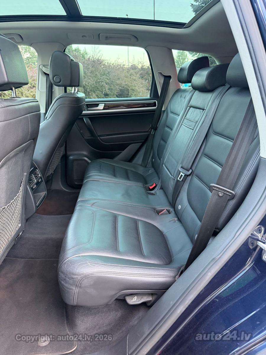 Blue Volkswagen Touareg 2011 in Tallinn, with an engine capacity of 3.00 L and mileage of 0 thousand km for 6499 €, photo 8 on AUTOMOTO.COM.LV
