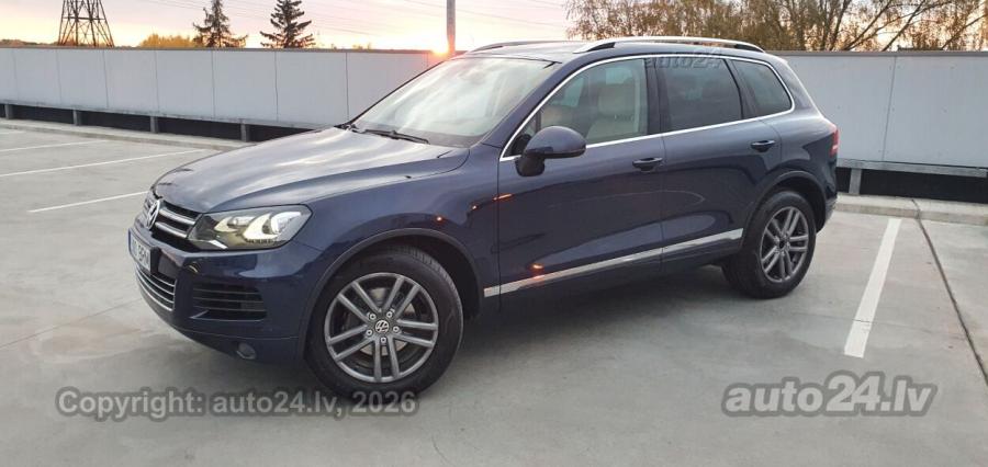 Blue Volkswagen Touareg 2013 in Tallinn, with an engine capacity of 3.00 L and mileage of 285 thousand km for 11990 €, photo 7 on AUTOMOTO.COM.LV